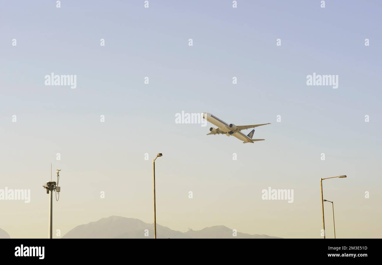 HONG KONG - OCTOBER 06: Singapore Airlines jet flight take-off from ...
