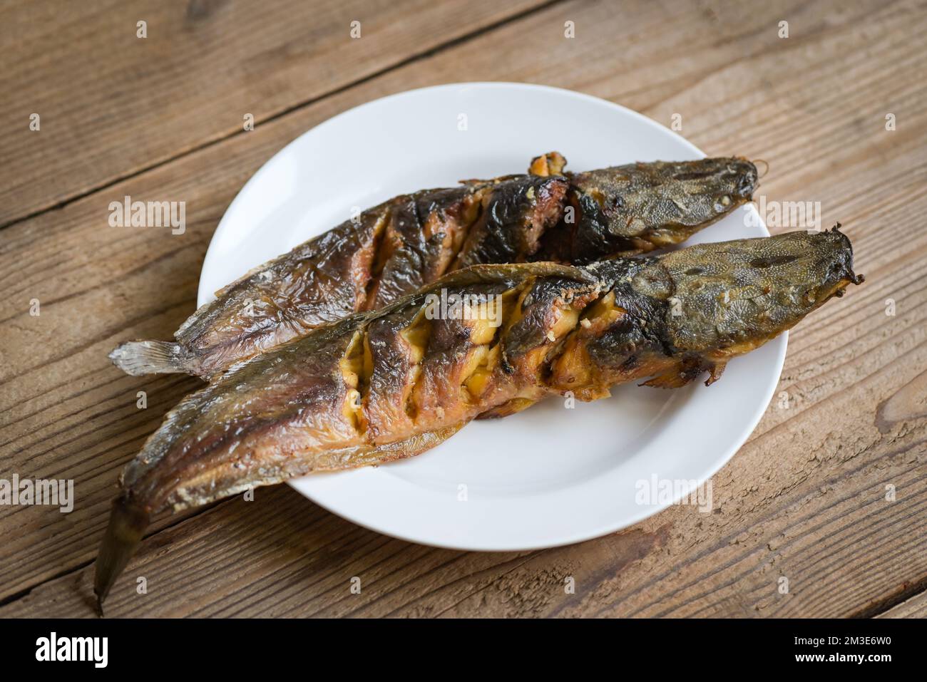 grilled catfish on white plate, Thailand food cooking catfish ...