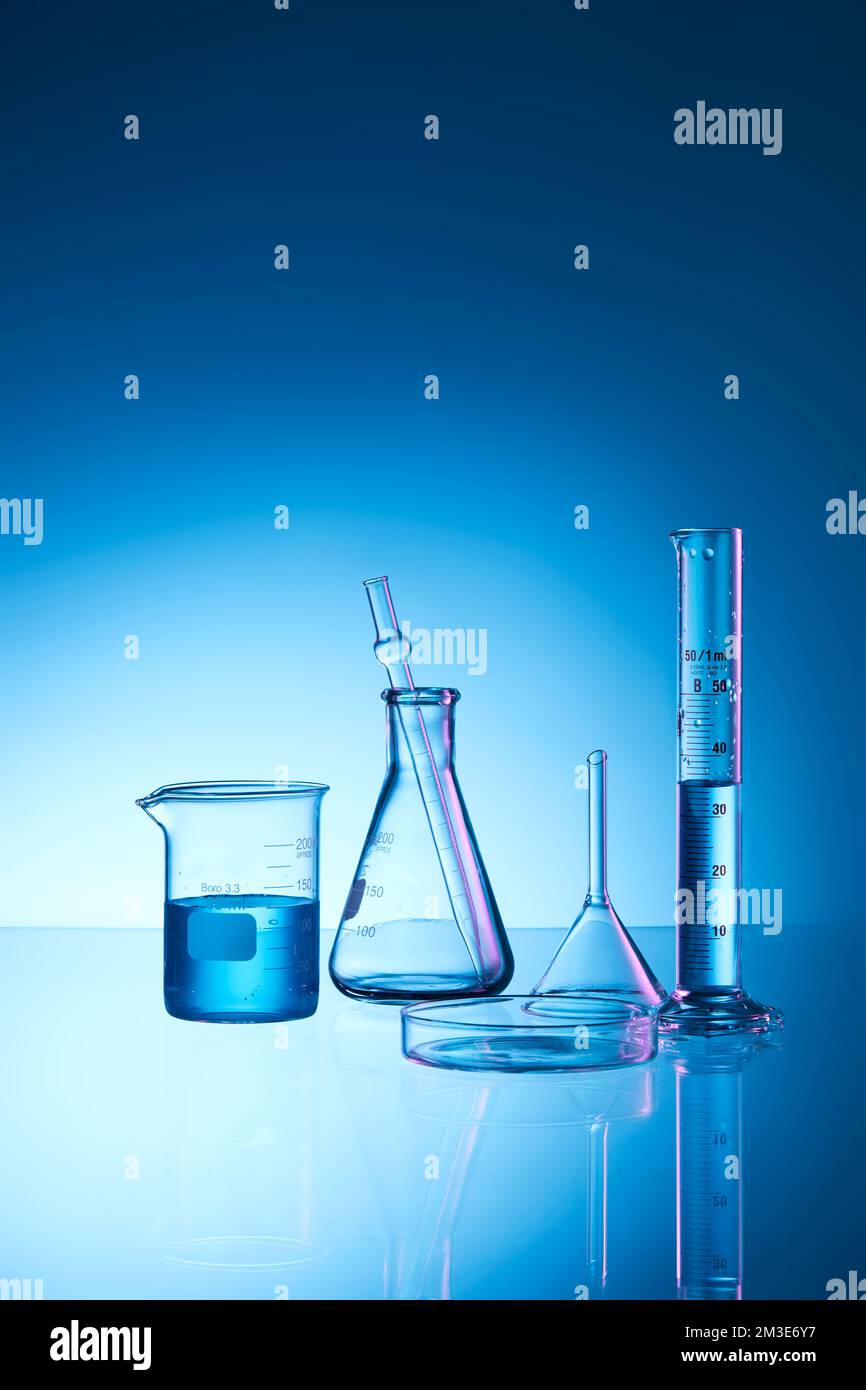 science lab with clear blue background and test tubes with blue ...