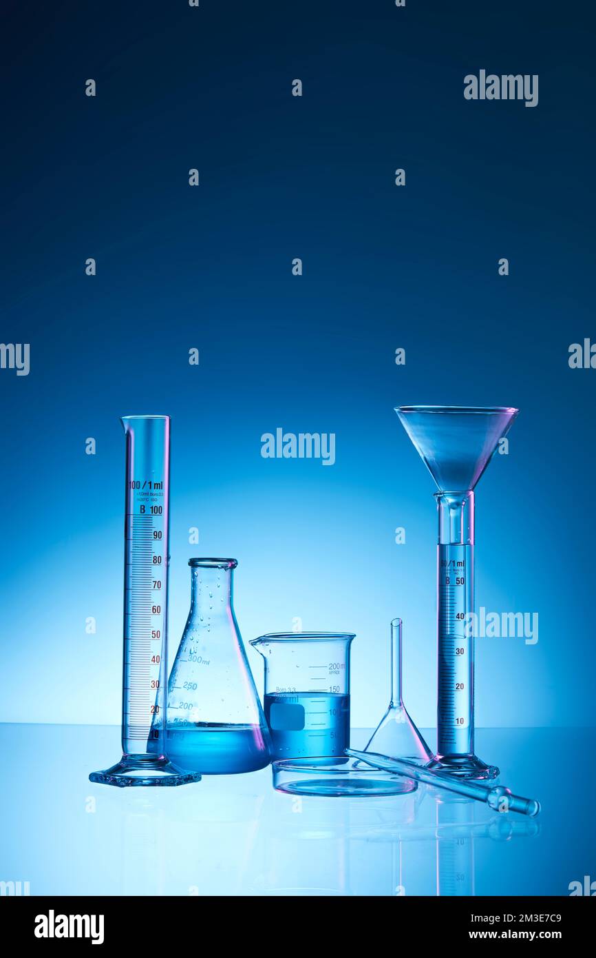 science lab with clear blue background and test tubes with blue ...