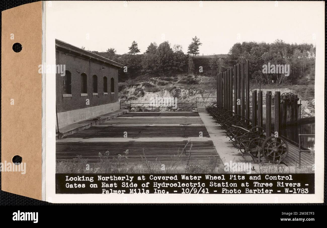 Looking northerly at covered water wheel pits and control gates on east ...
