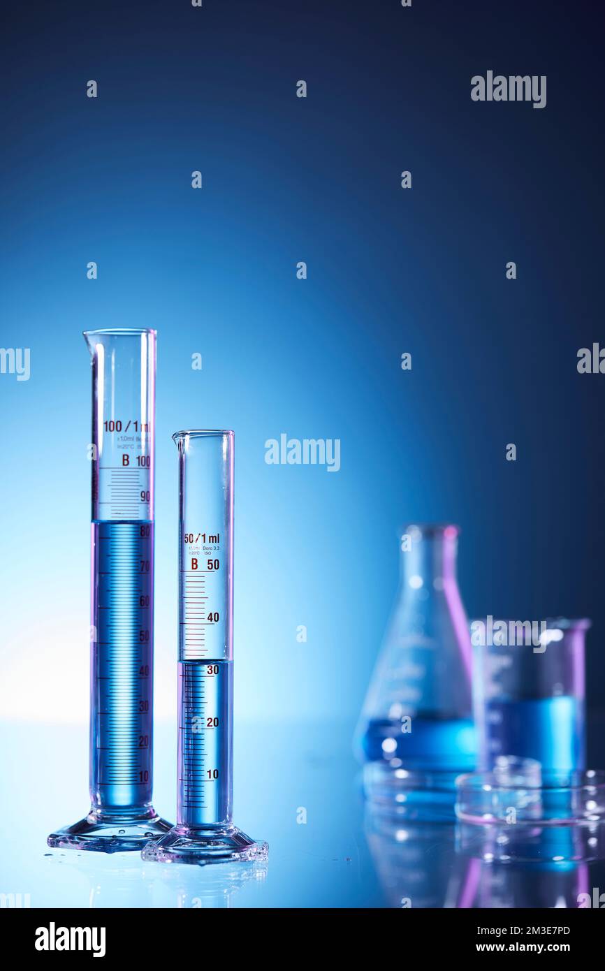 science lab with clear blue background and test tubes with blue ...