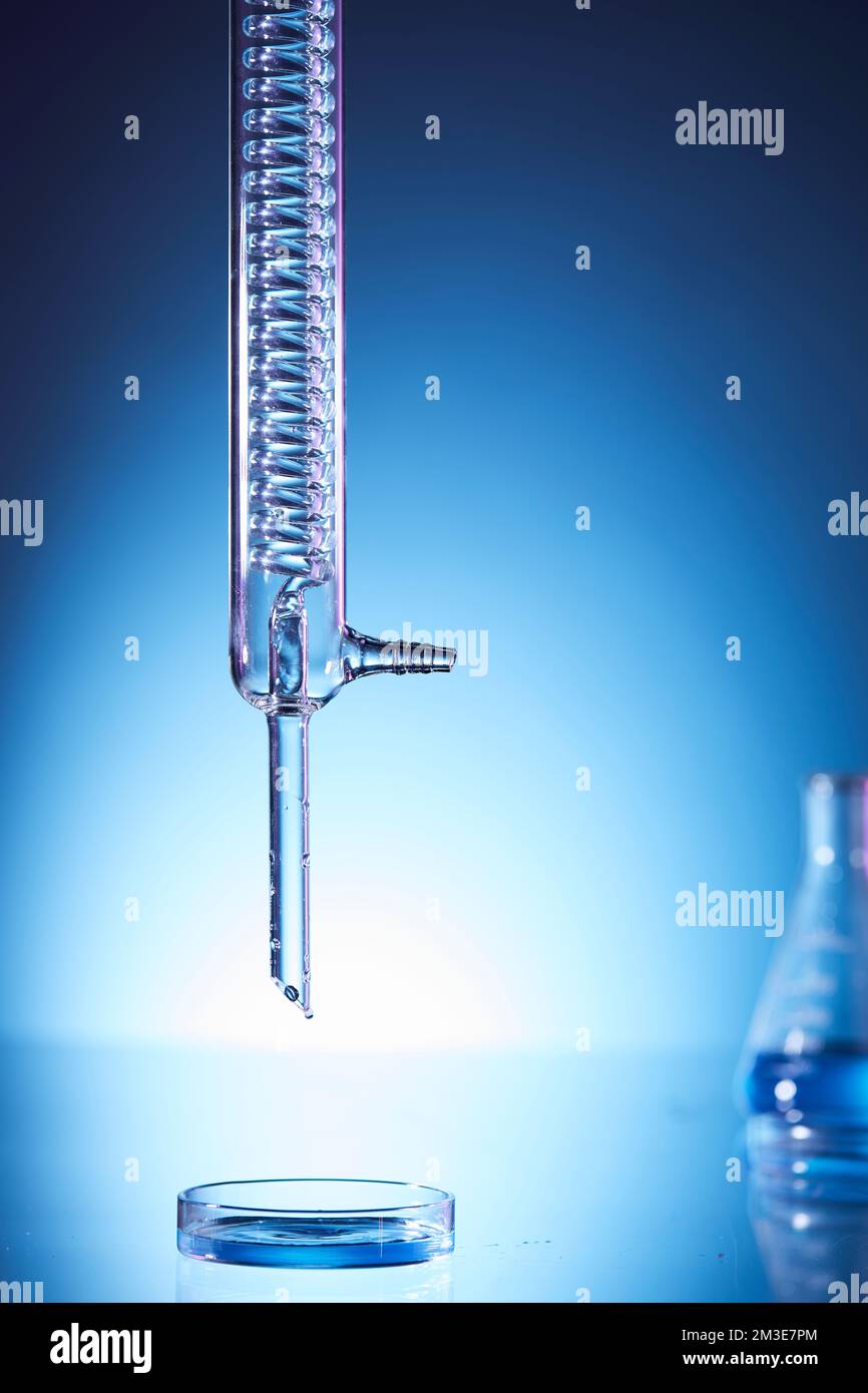 science lab with clear blue background and test tubes with blue ...
