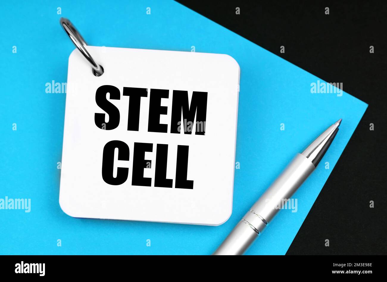 Medicine and health concept. On the black surface lies blue paper, a ...