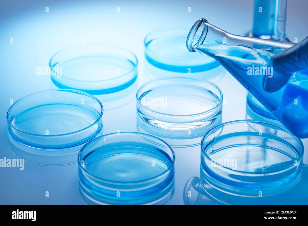 science lab with clear blue background and test tubes with blue ...