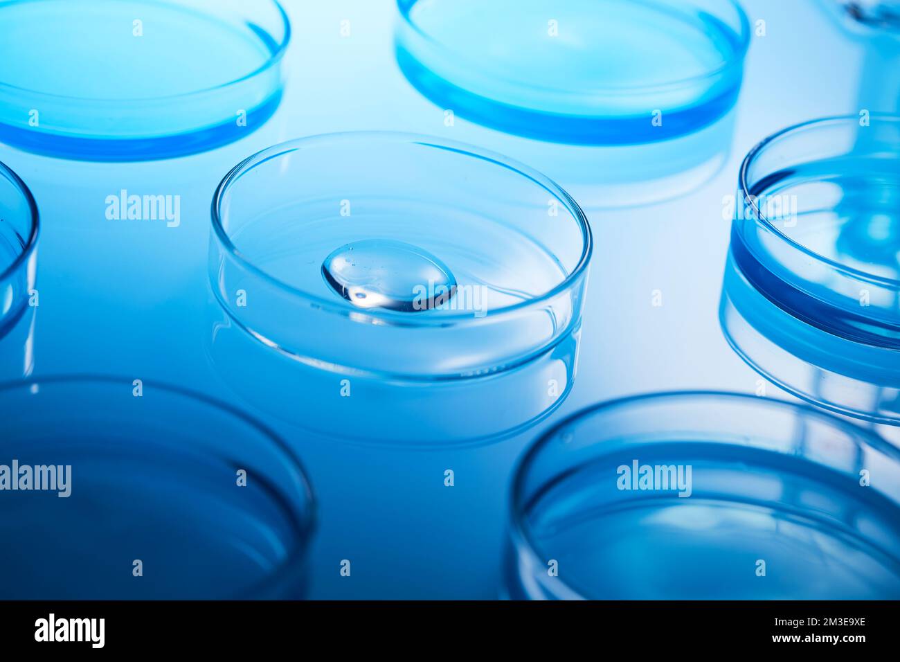 science lab with clear blue background and test tubes with blue ...