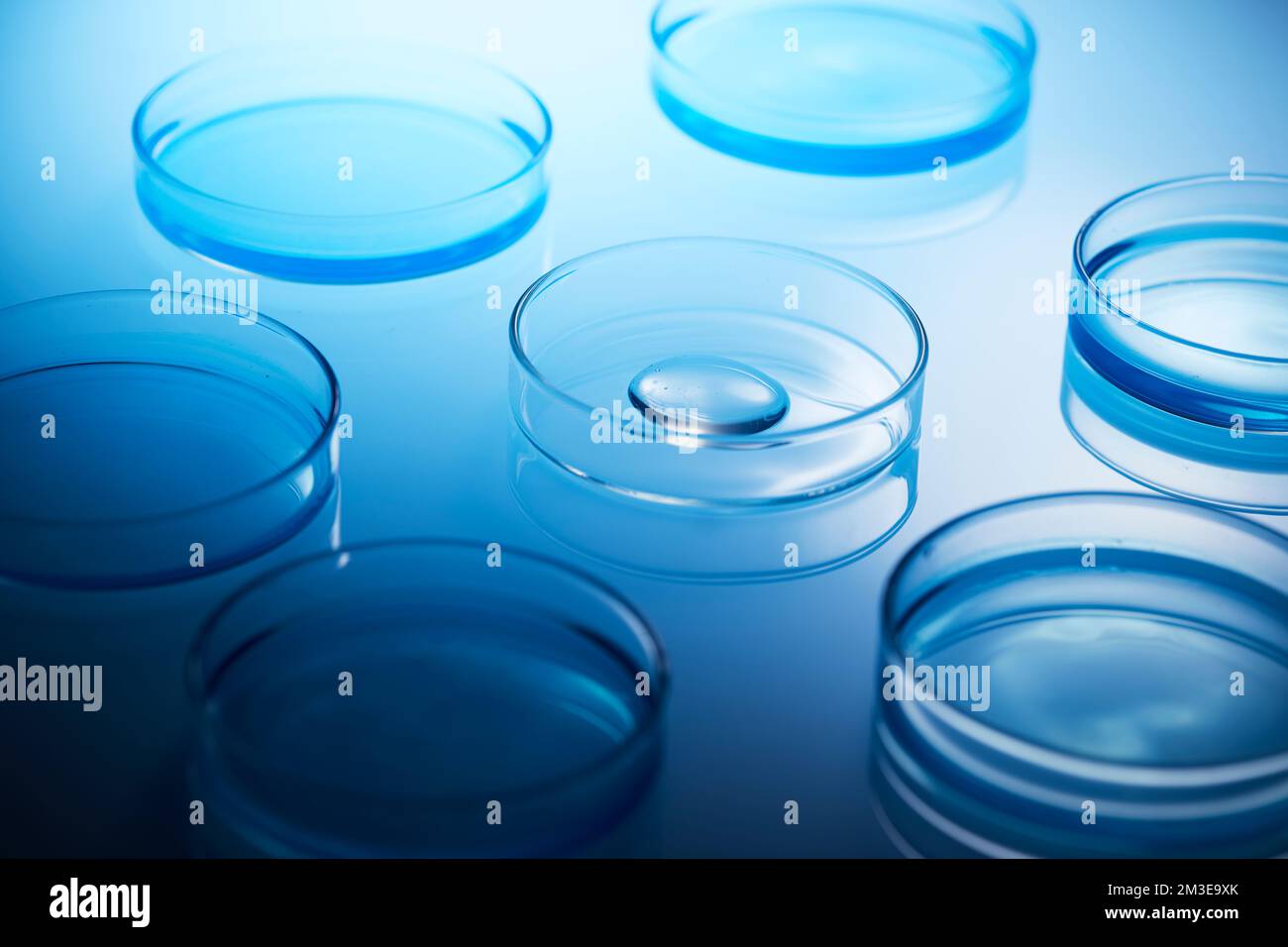 science lab with clear blue background and test tubes with blue ...