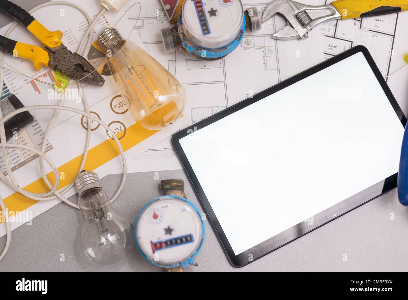 Tablet computer with architecture and construction tools and blueprints ...