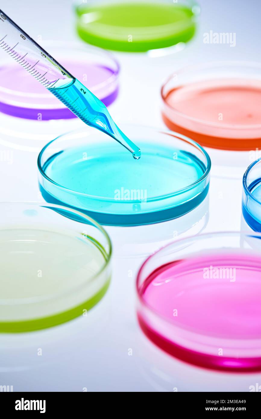 science lab with clear blue background and test tubes with blue ...