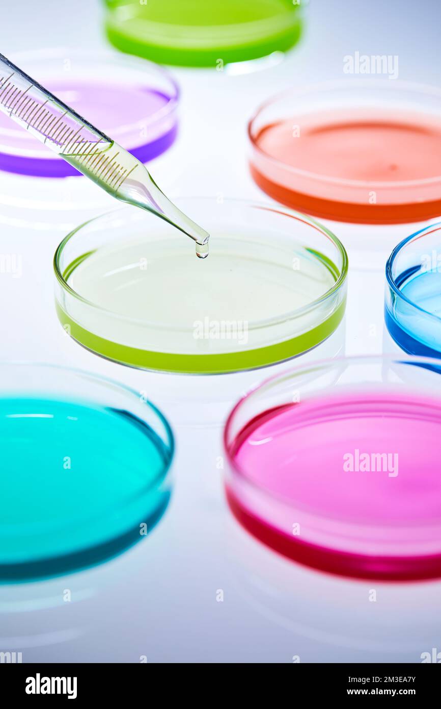science lab with clear blue background and test tubes with blue ...