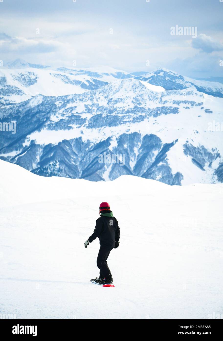 Snowboarder in steep slope hi-res stock photography and images - Alamy
