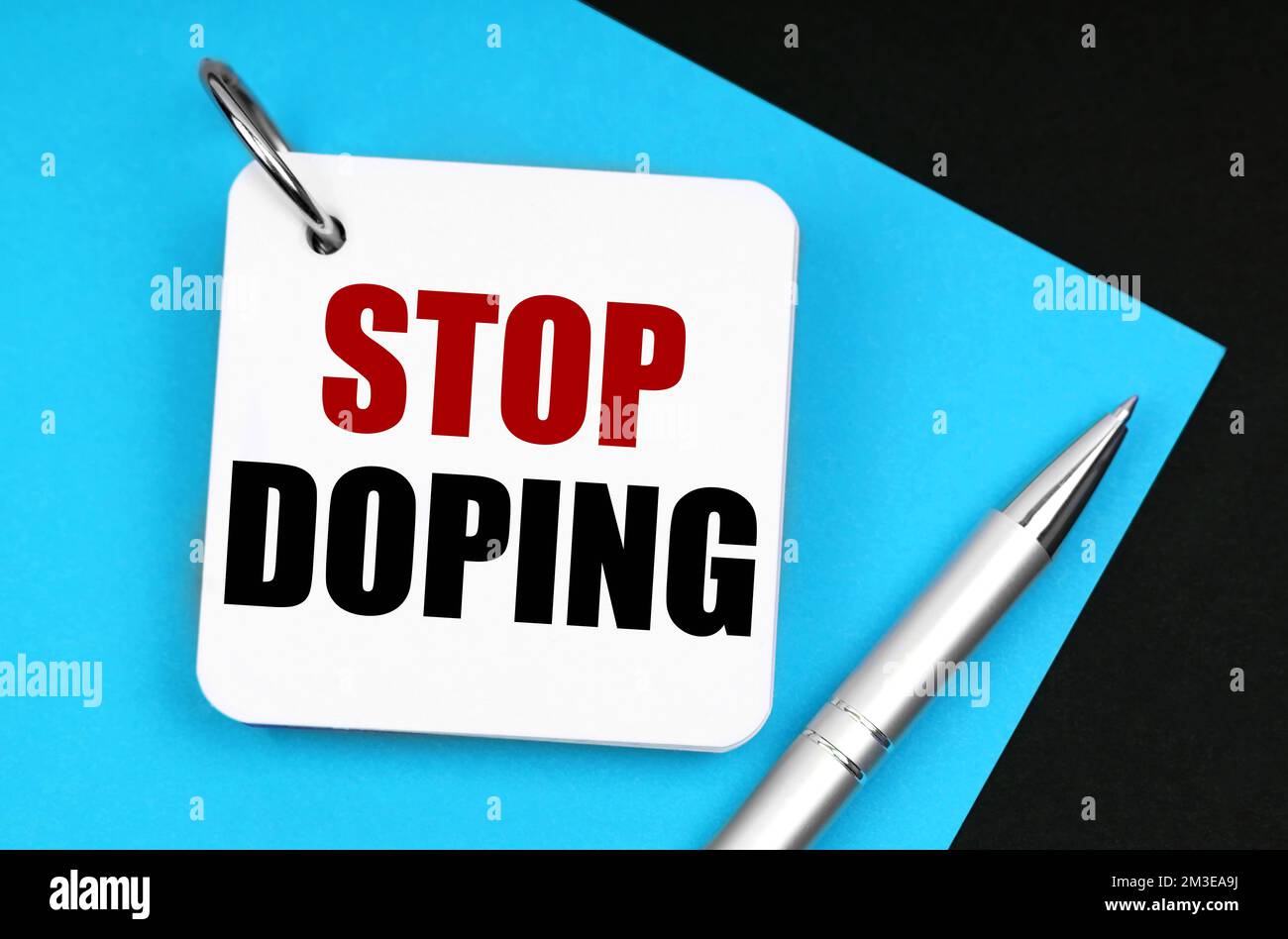 Medicine and health concept. On the black surface lies blue paper, a ...