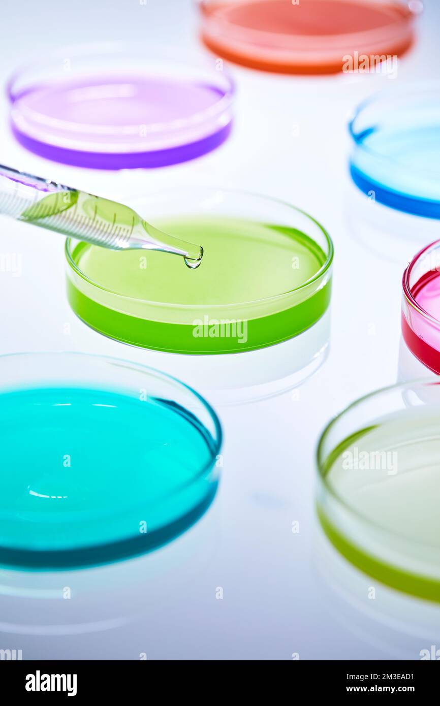 science lab with clear blue background and test tubes with blue ...