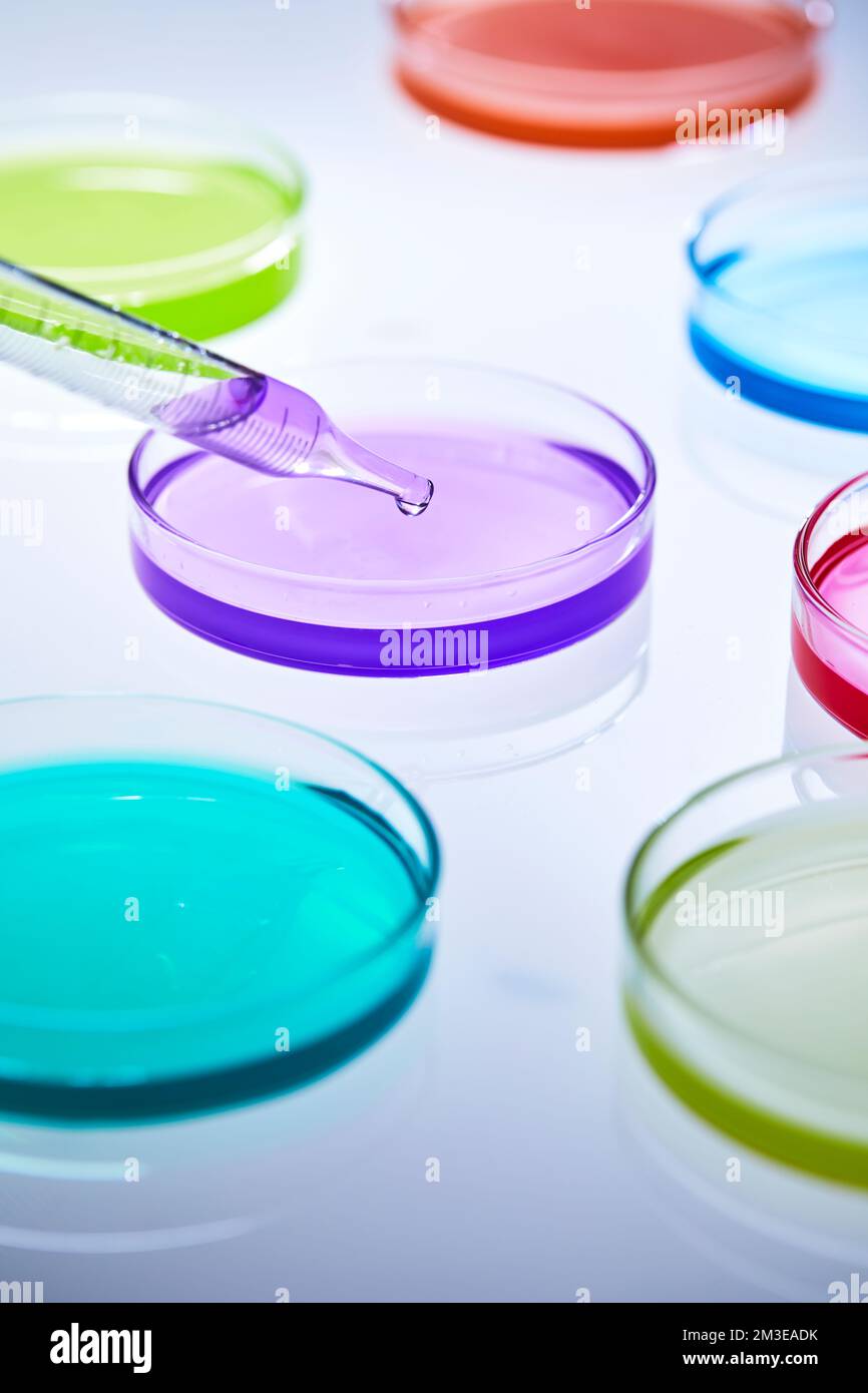 science lab with clear blue background and test tubes with blue ...