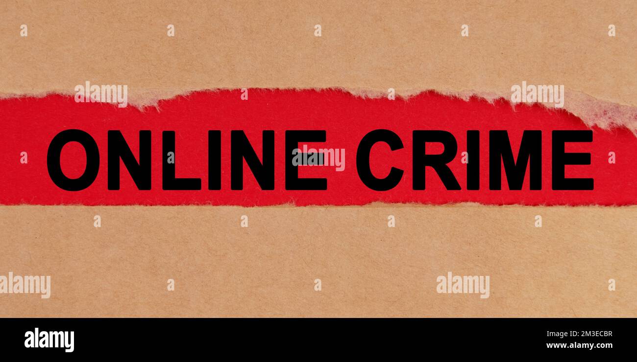Law concept. Among the torn sheets of paper on a red background, the ...