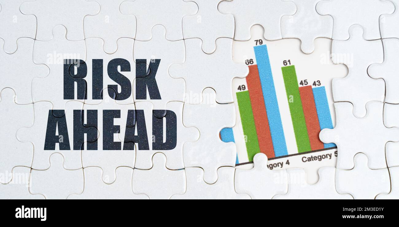 Economy and business concept. On white puzzles there is an inscription ...