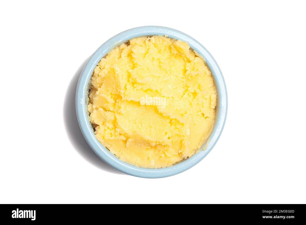 Ghee in a butter dish isolate on a white background.Top view Stock ...