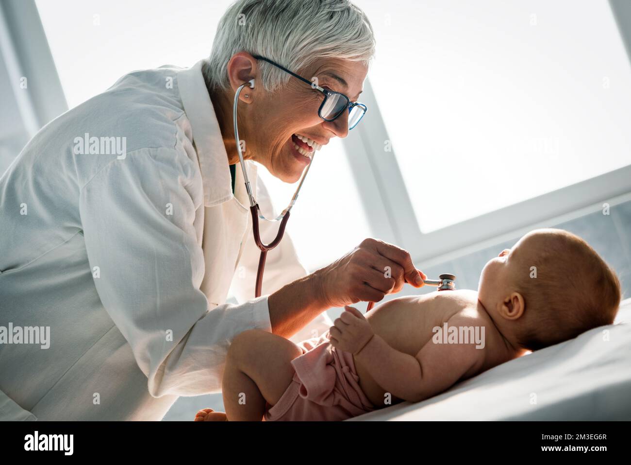 Pediatric doctor exams little baby. Health care, medical examination ...