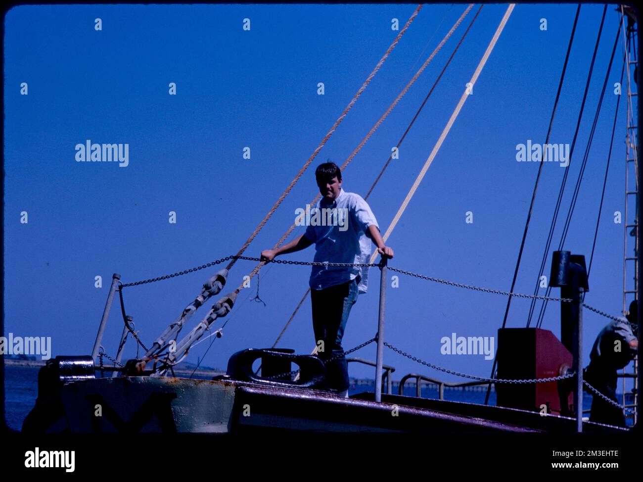 Man standing on a boat with rigging , Boats, Boat & ship industry ...