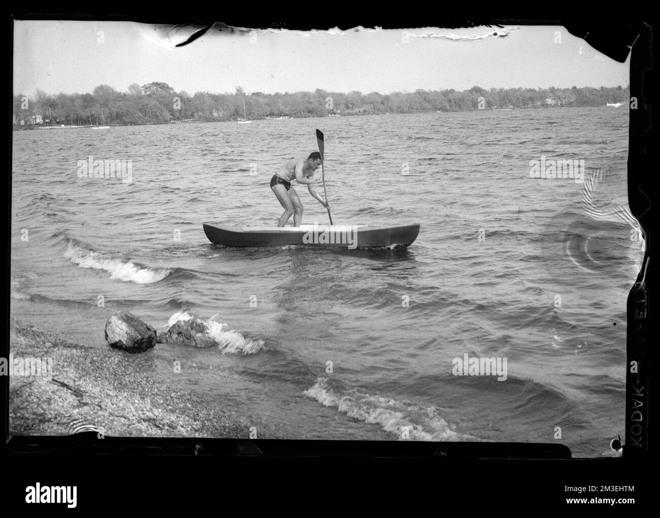 Man rowing boat boats Black and White Stock Photos & Images - Alamy