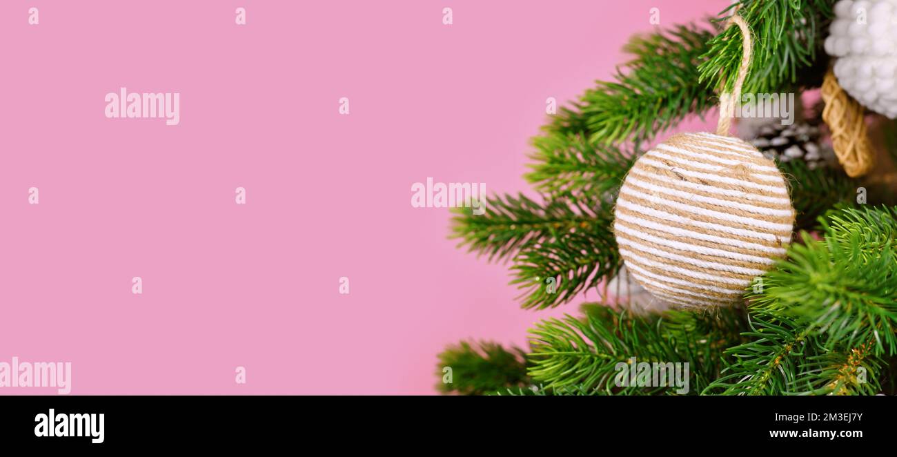 Banner with Christmas tree branches with natural ornament bauble made ...