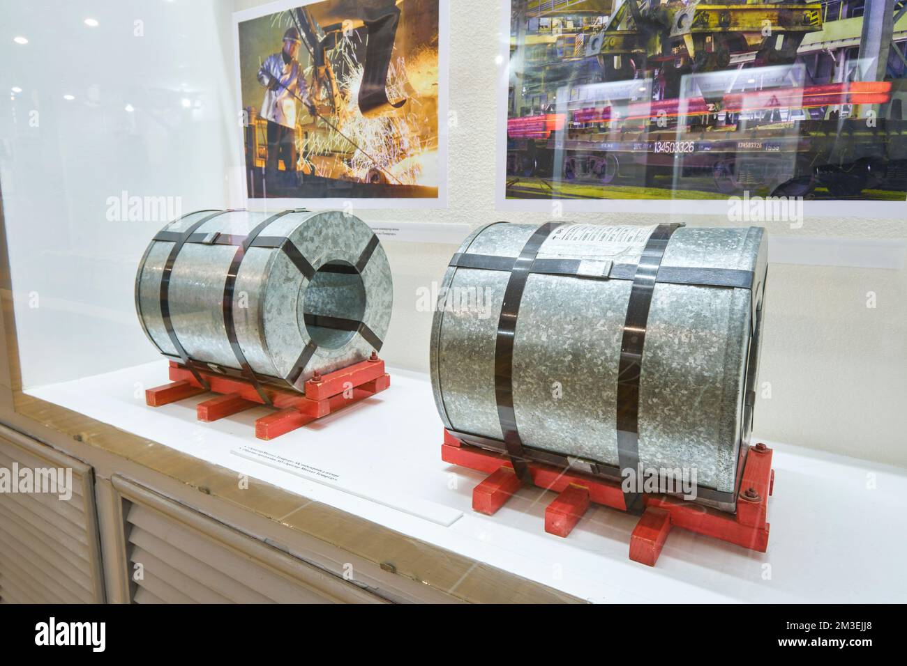 A gallery, displaying rolls, spools of finished product related to the ...