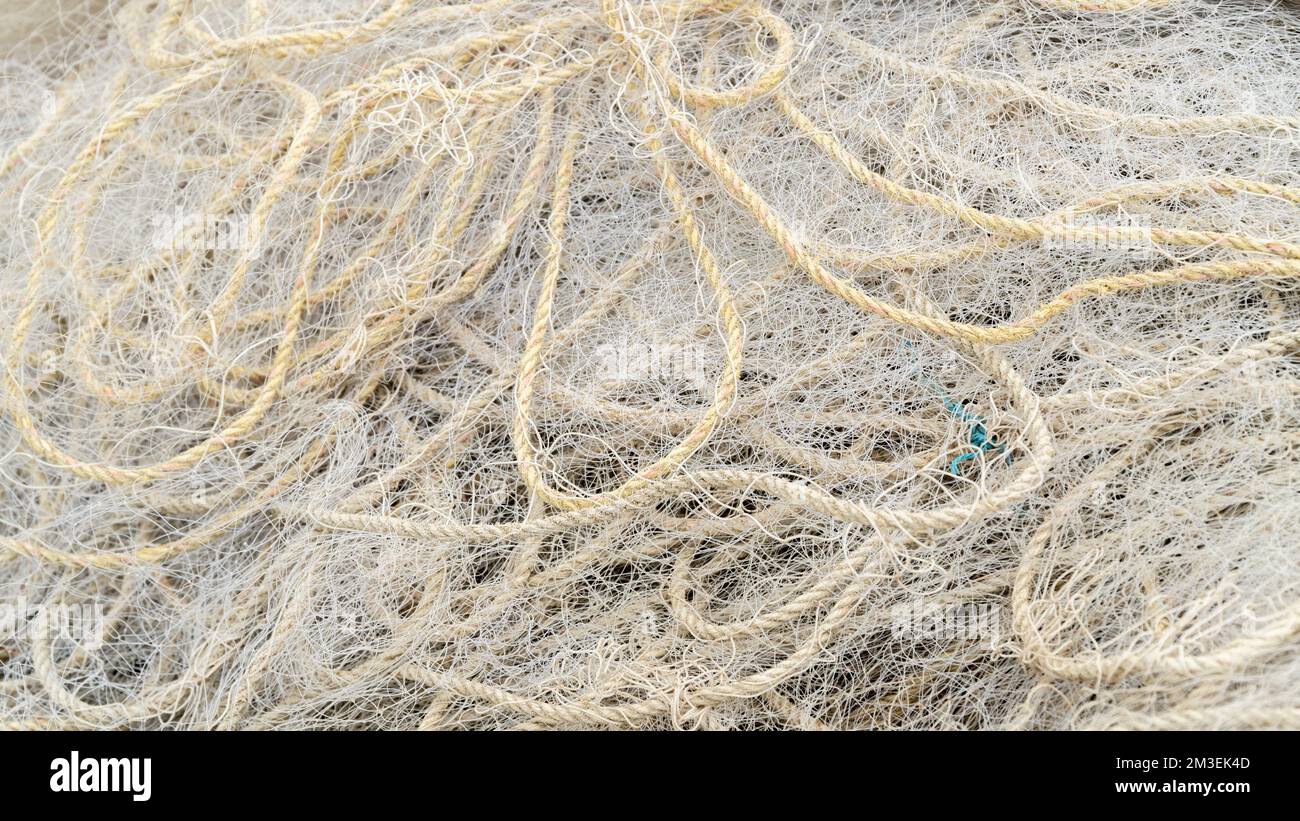Fishing net and tackle close-up background Stock Photo - Alamy