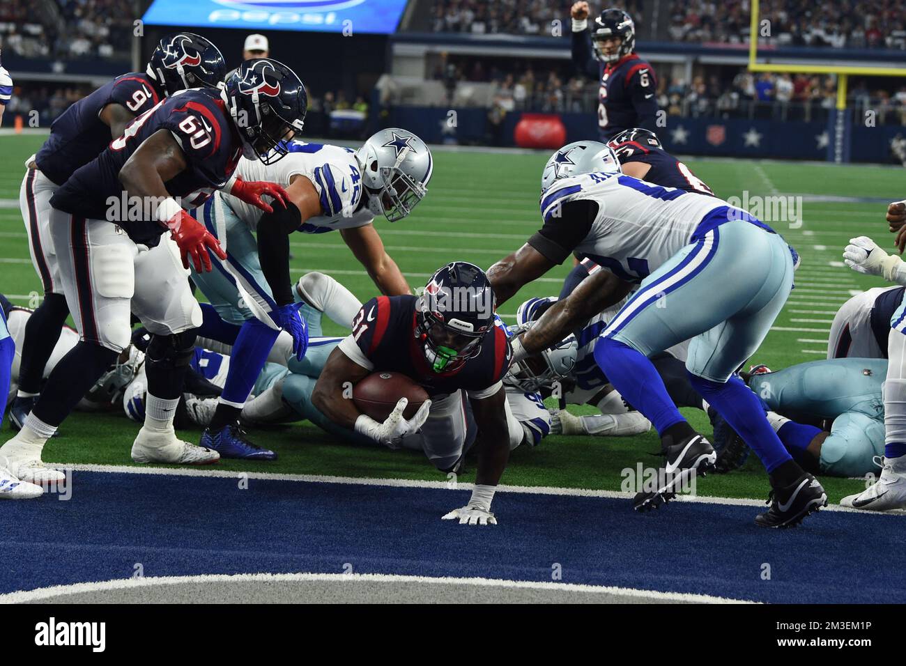 Houston Texans running back Dameon Pierce (31) scores a touchdown on a ...