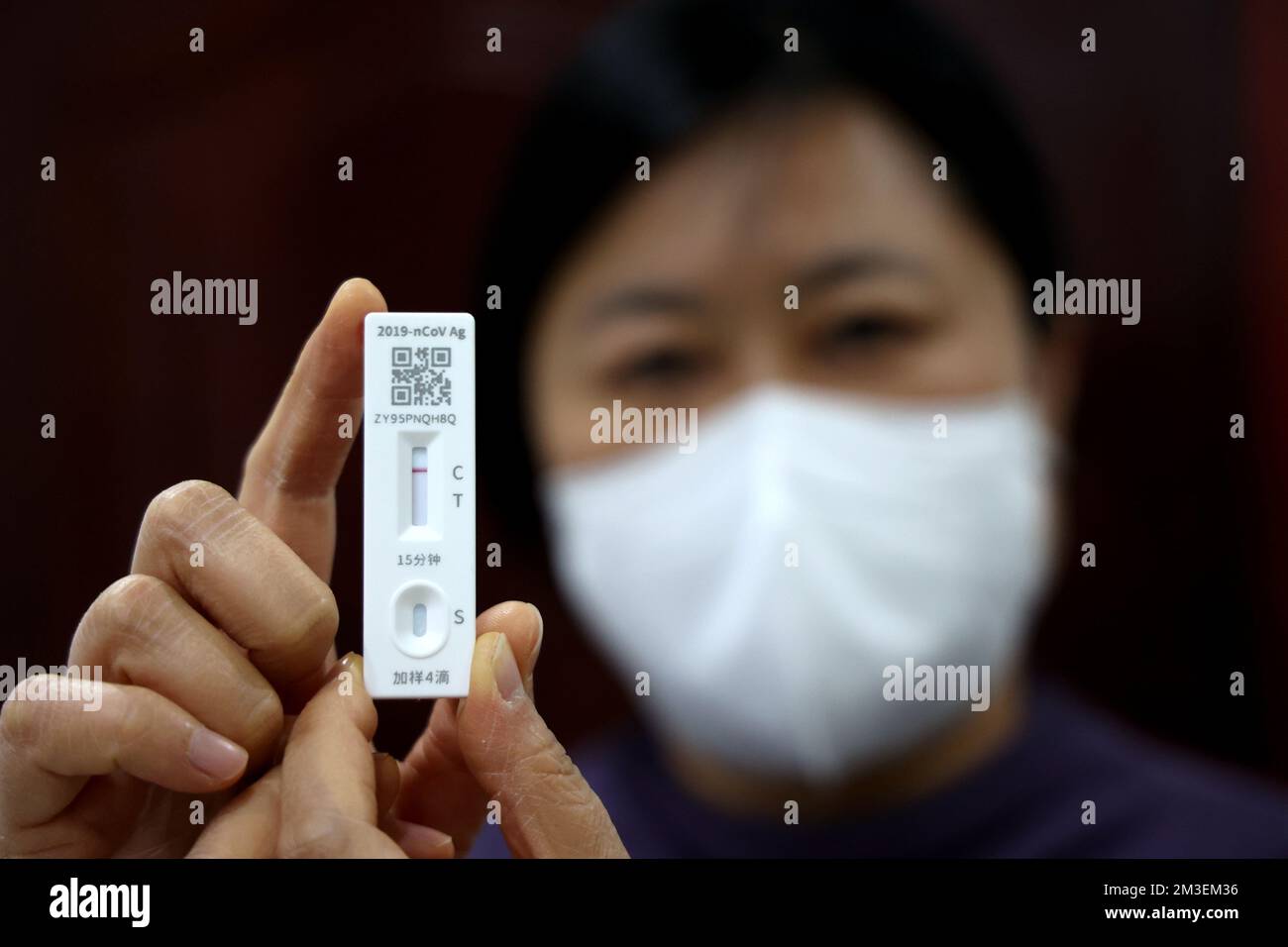 BINZHOU, CHINA - DECEMBER 15, 2022 - A citizen shows the results of an ...