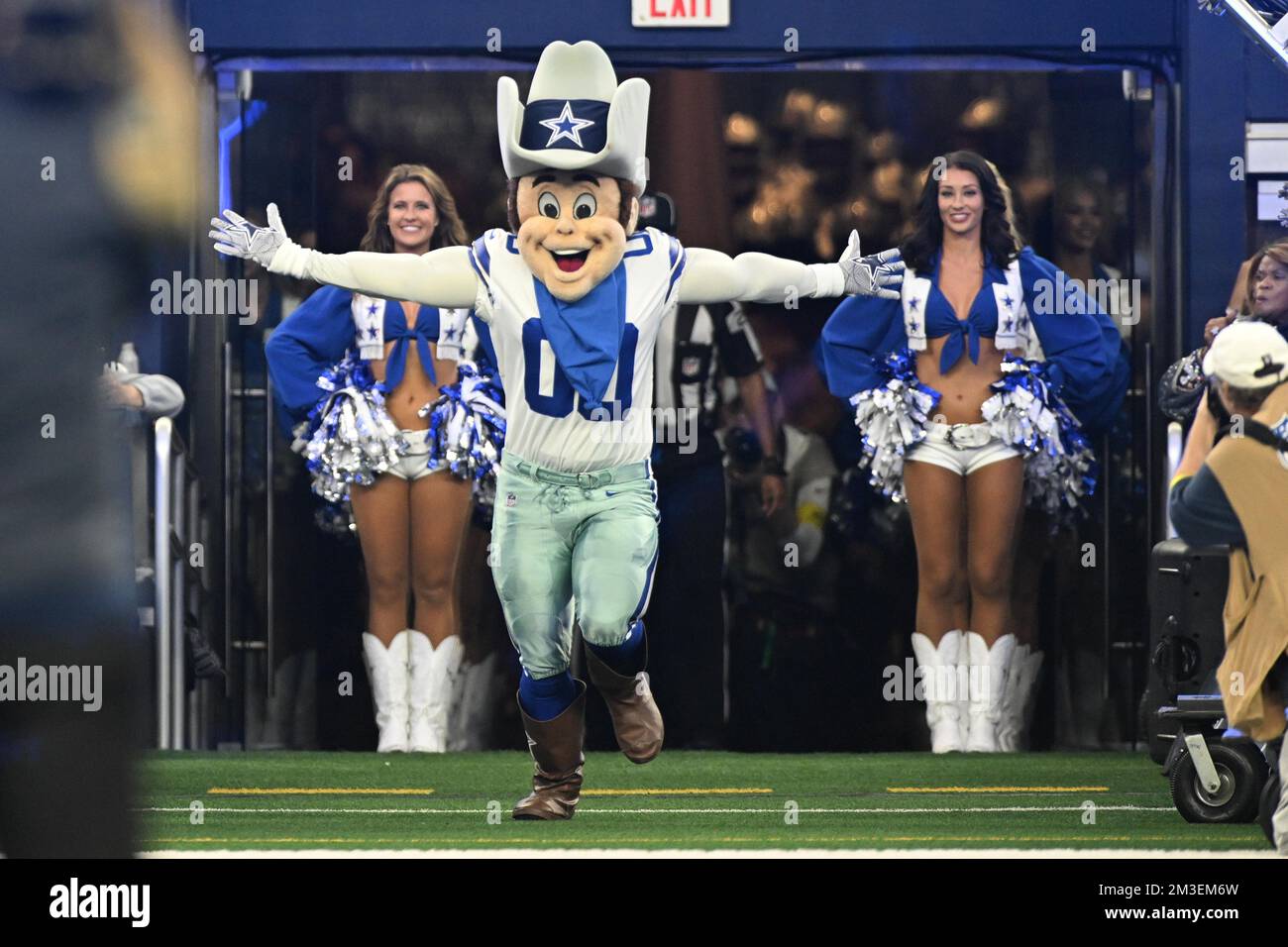 Dallas Cowboys take the field led by mascot Rowdy, an ever-smiling ...