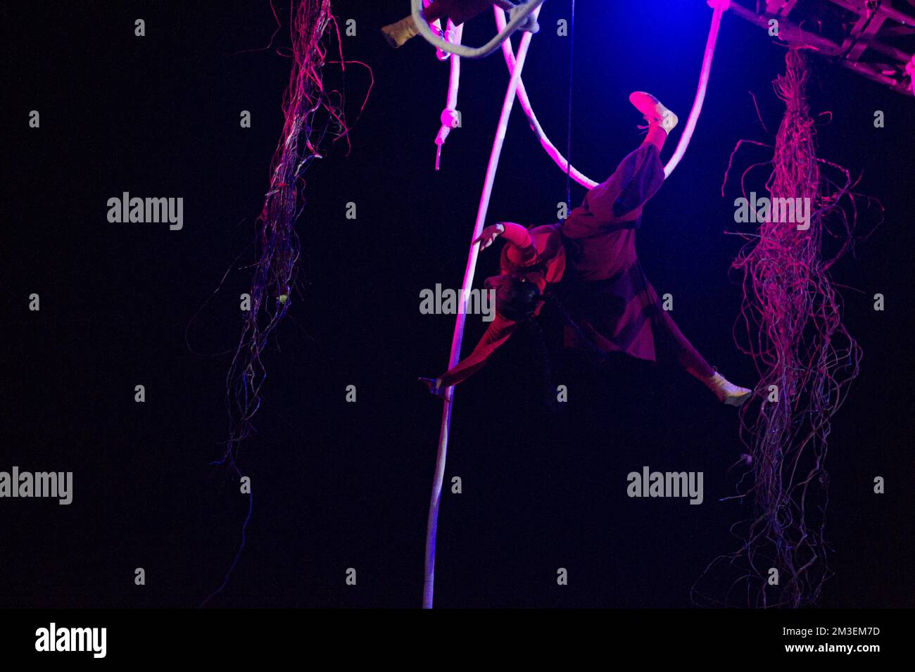 Actors hang from a crane during the Christmas play 'The tree of ...