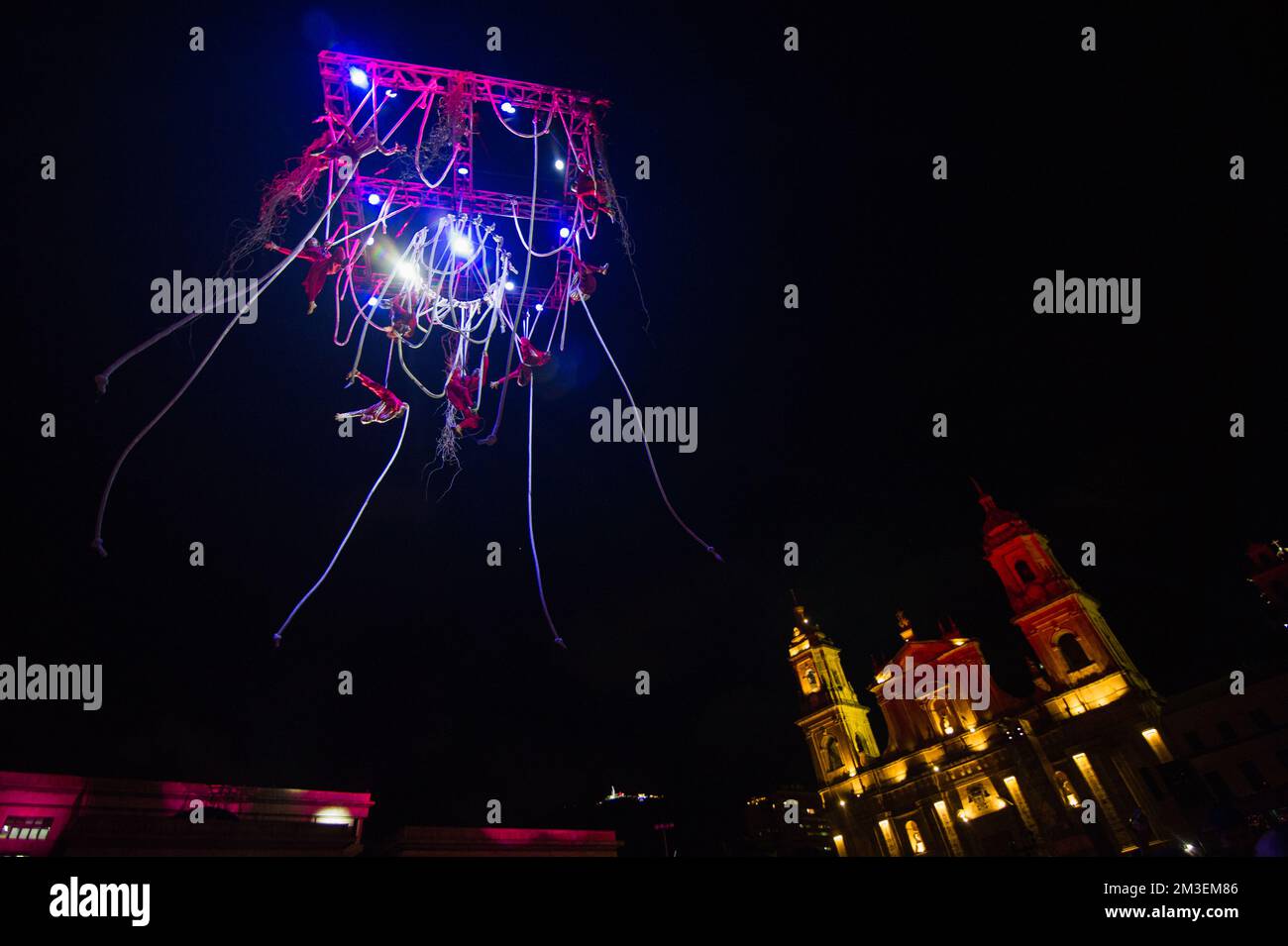 Actors hang from a crane during the Christmas play 'The tree of ...