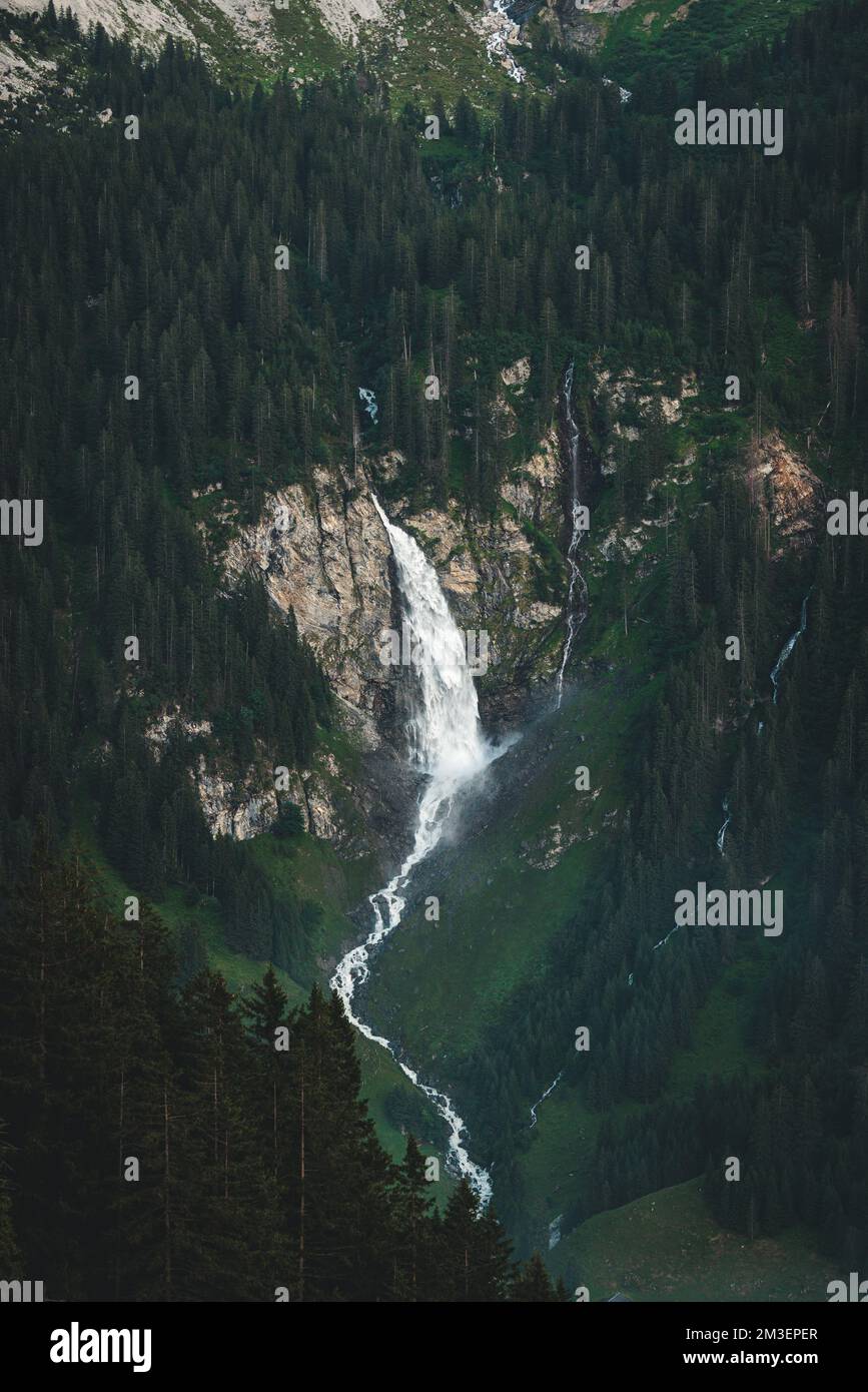 A typical alpine landscape with waterfalls in Switzerland Stock Photo ...