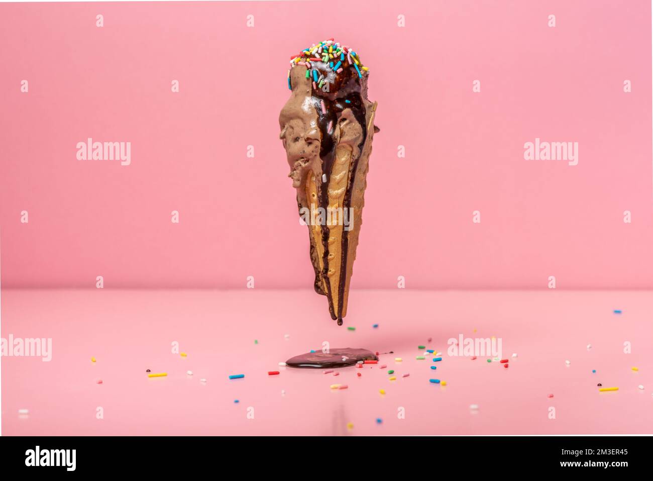 funny creative concept of flying wafer cone with ice cream covered ...