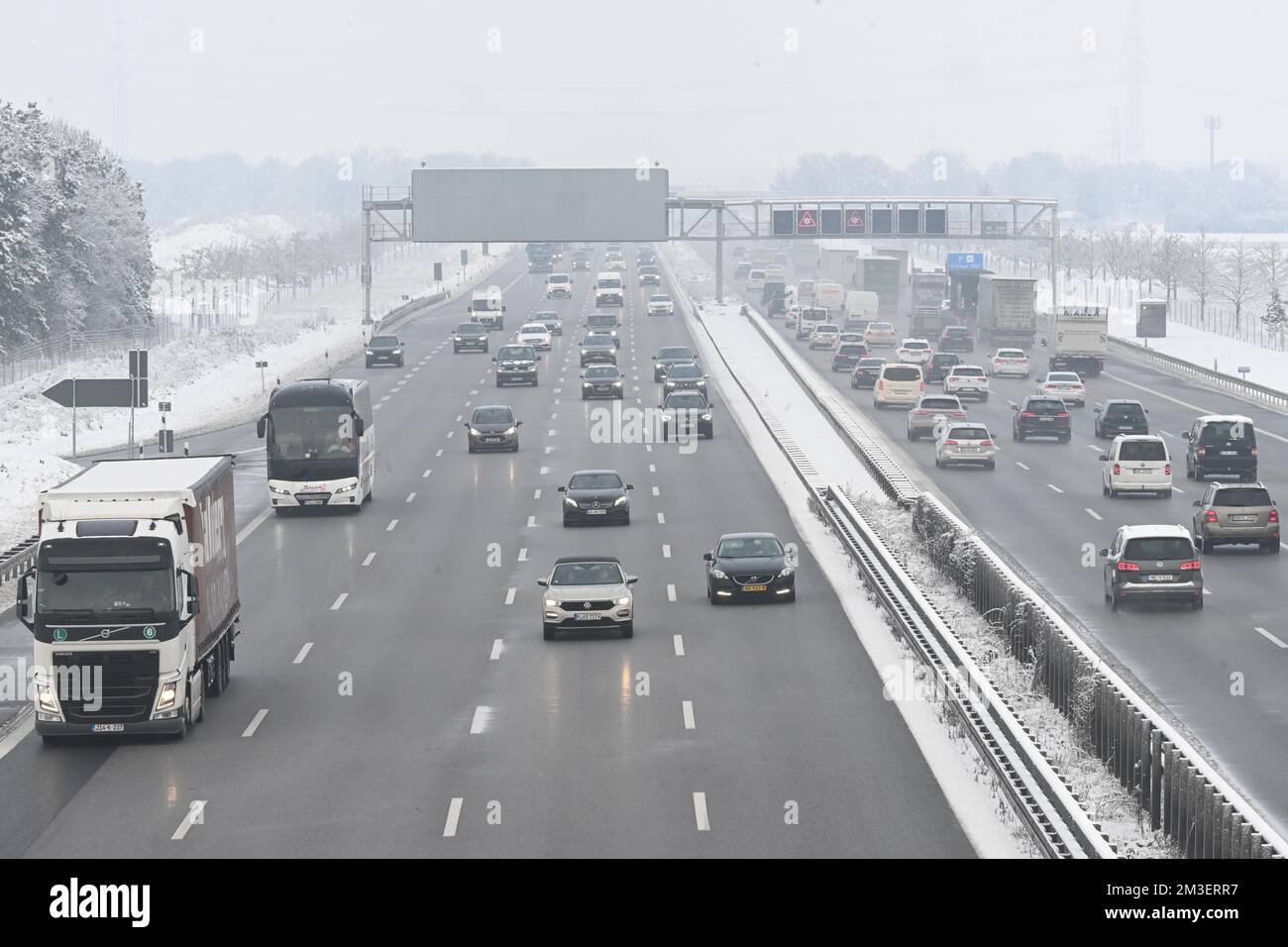 Munich, Germany. 15th Dec, 2022. Cars, trucks and buses are driving on ...
