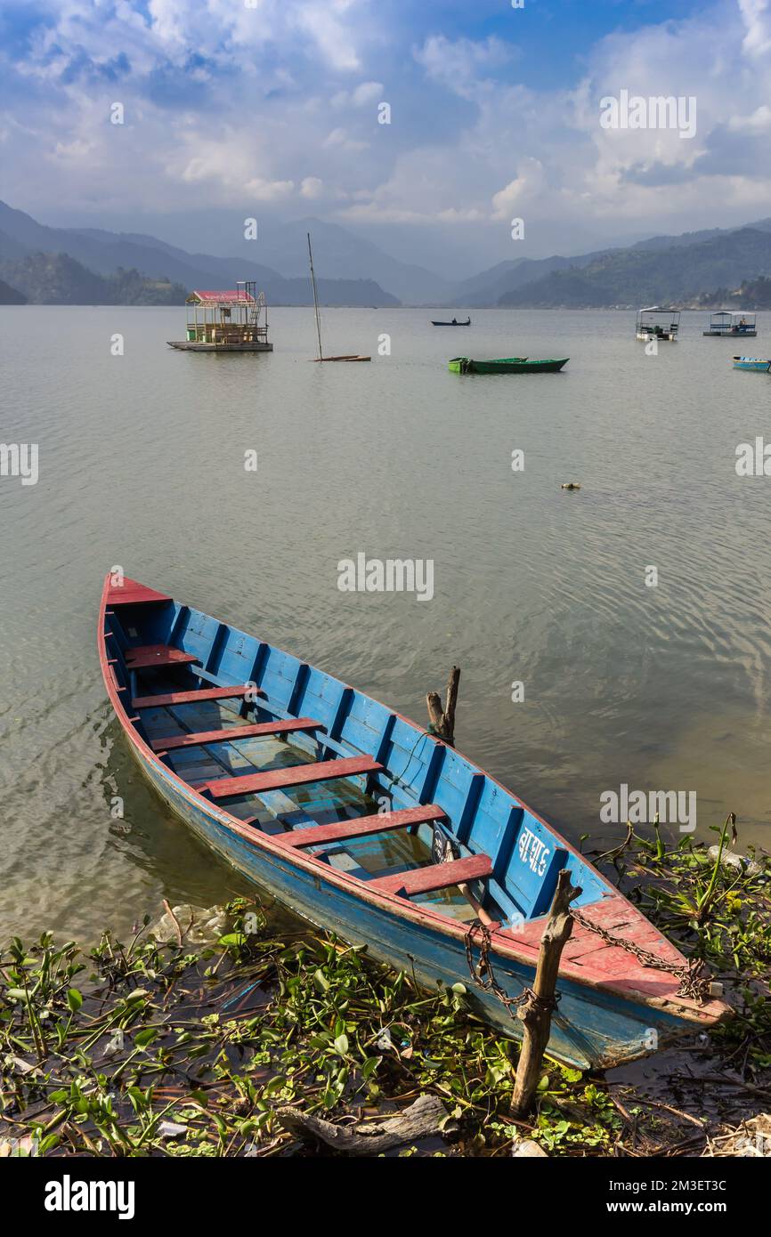 Old wooden boat at the Phewa Lake in Pokhara, Nepal Stock Photo - Alamy