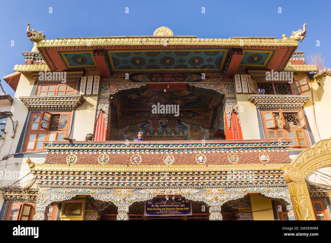 Balcony of a richly decorated building at the Boudhanath stupa in ...