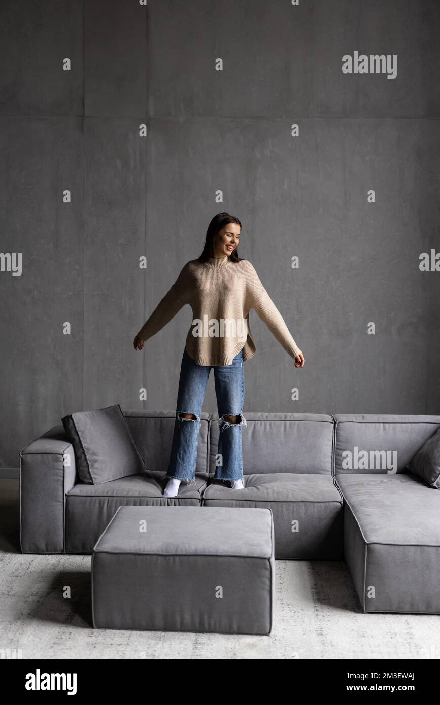 Full body beautiful woman meloman in casual clothes and wireless ...