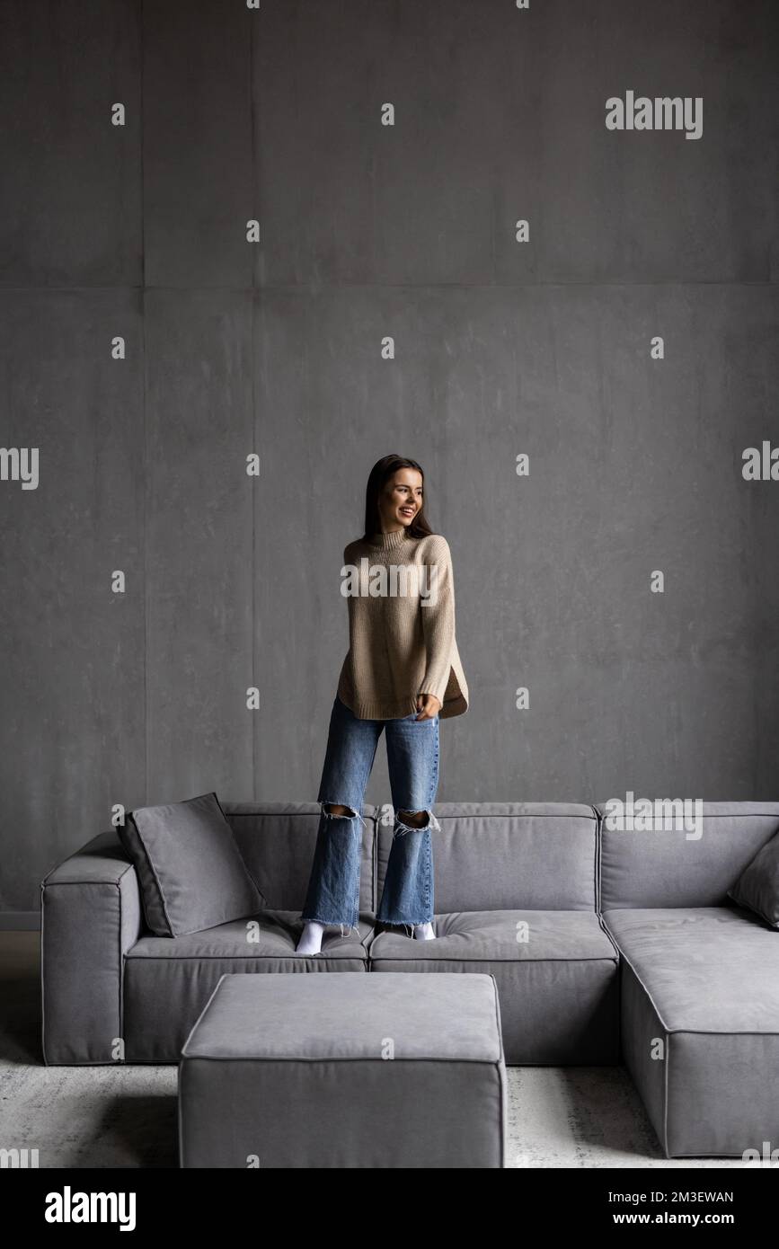 Full body beautiful woman meloman in casual clothes and wireless ...