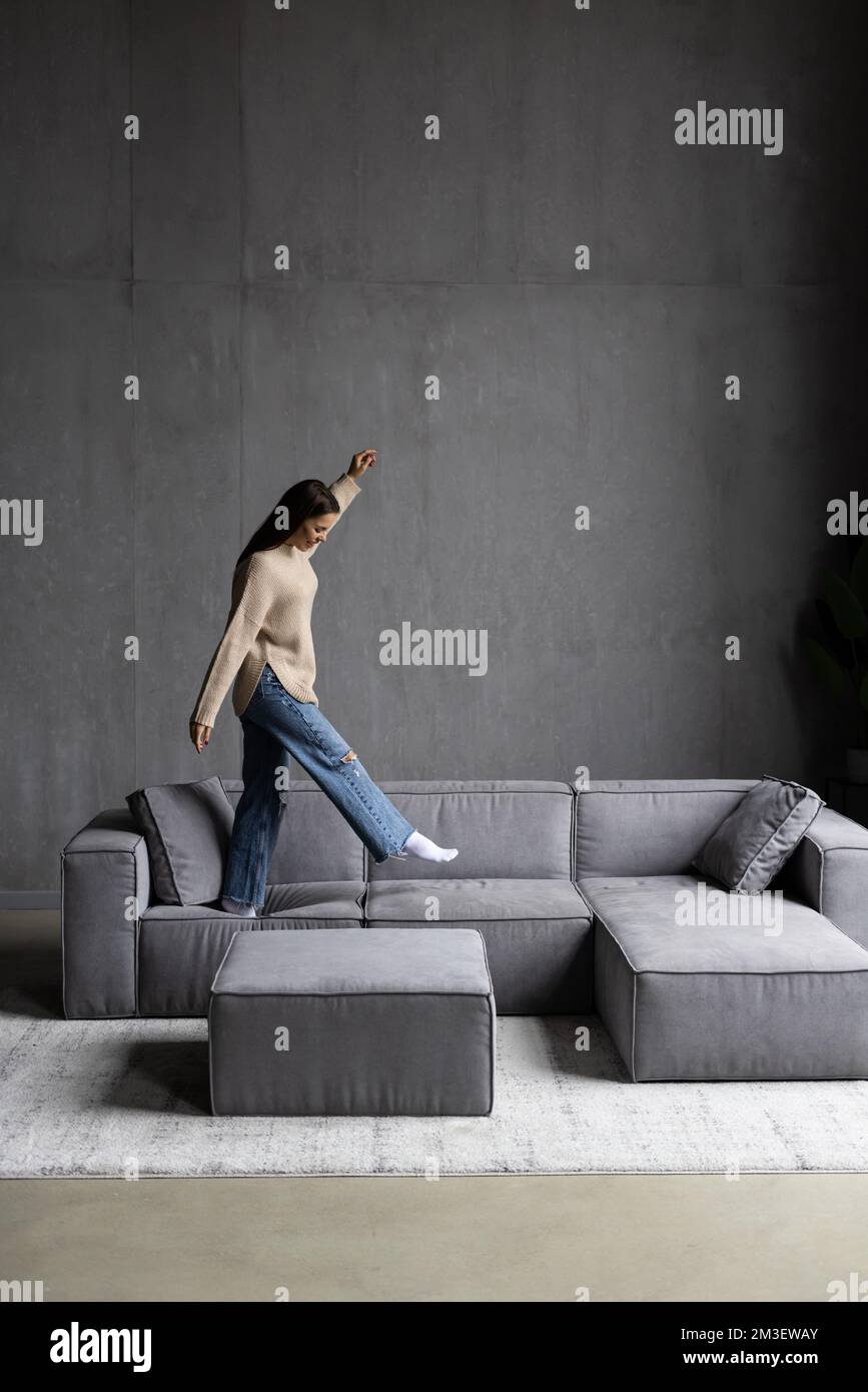 Full body beautiful woman meloman in casual clothes and wireless ...