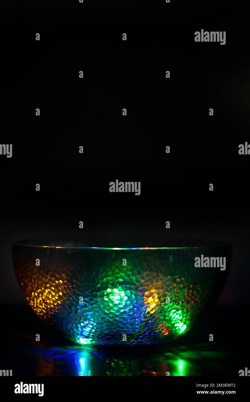 colorful rainbow lights inside a glass bowl Stock Photo - Alamy