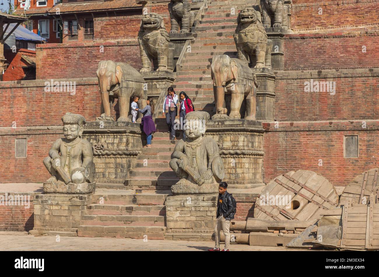 Stairs and sculptures at the Nyatapola temple on Durbar Square of ...