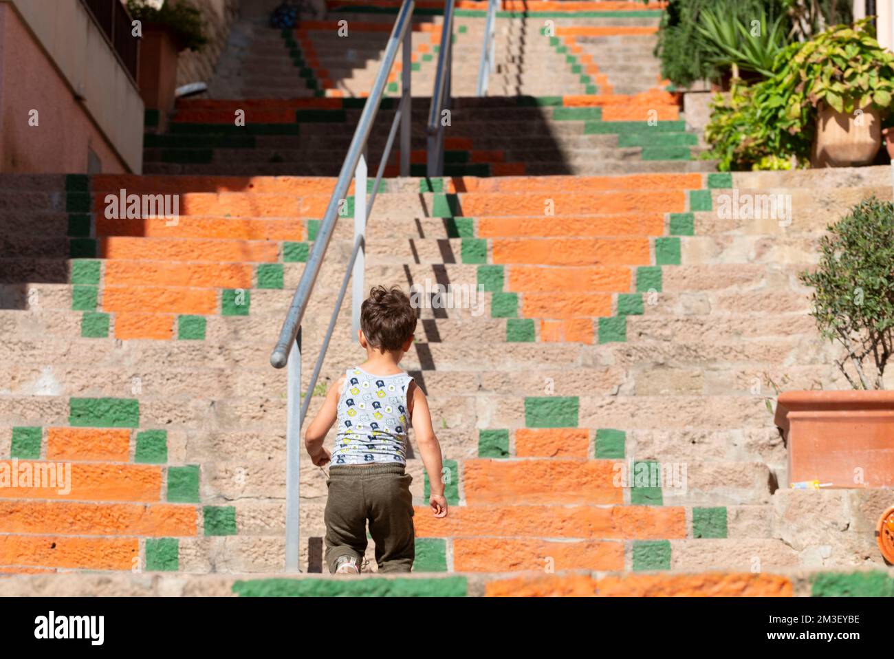 Child climbing step hi-res stock photography and images - Alamy