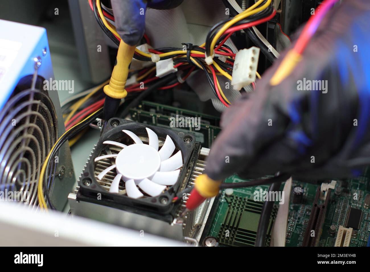 CPU cooling fan in an old computer with ammeter probes Stock Photo - Alamy