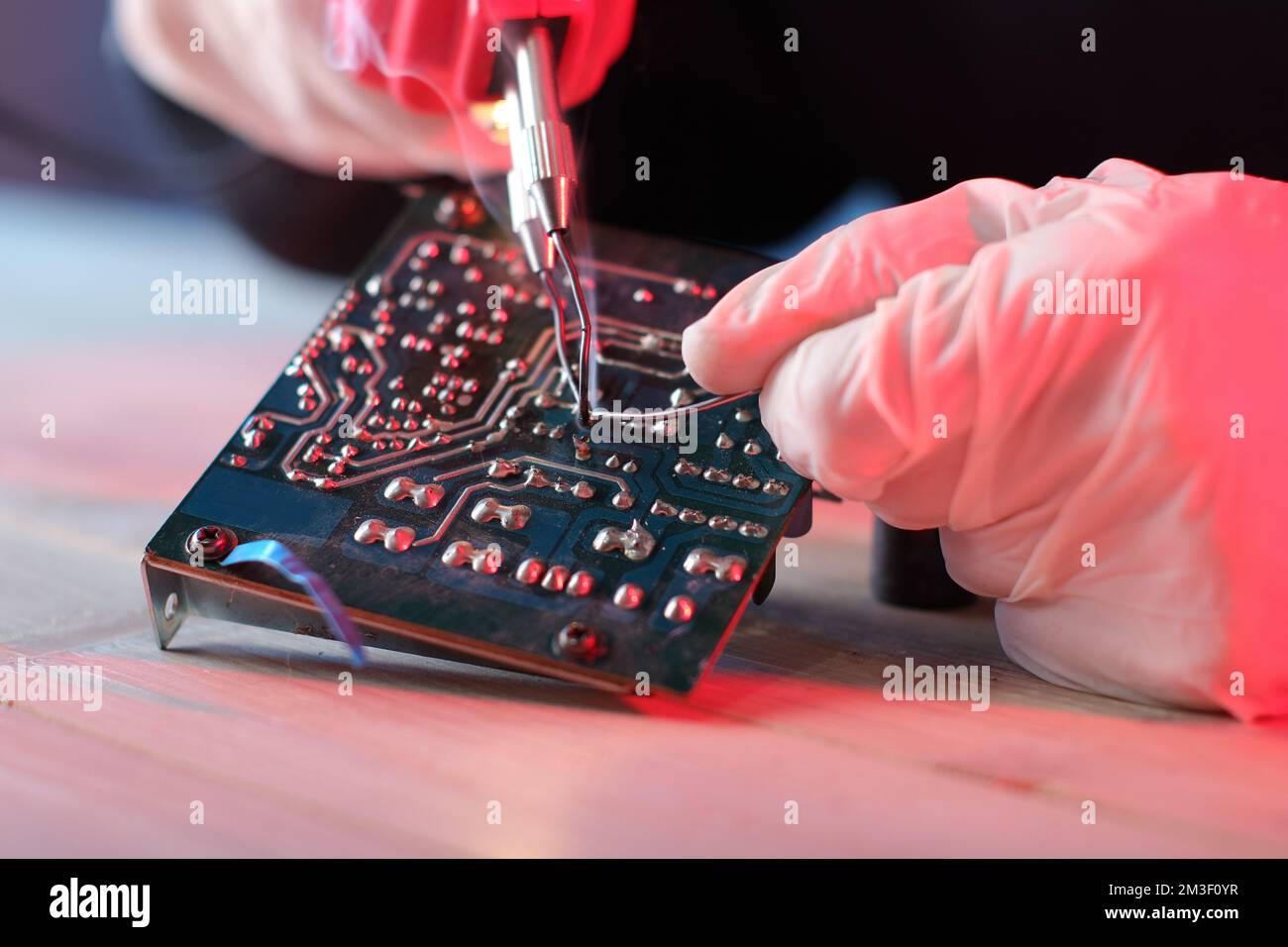 soldering reda transformer soldering iron on the table by person Stock ...