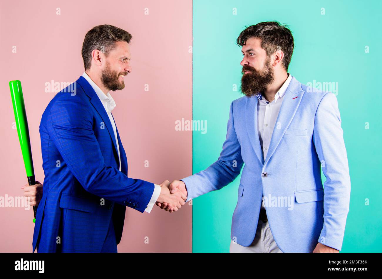 Business partners competitors office colleagues shaking hands. Tricky ...