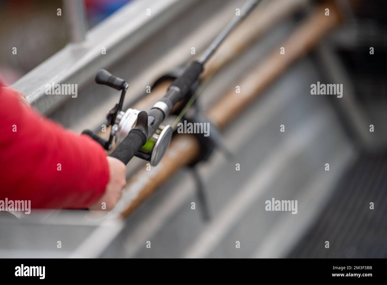 model girl fishing in a boat in summer in australia Stock Photo - Alamy
