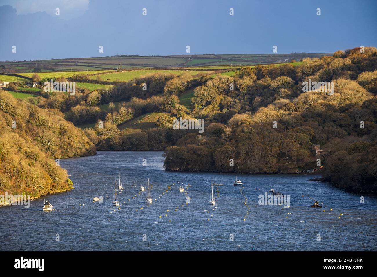 Pont Pill flowing into Fowey Harbour in the autumn from Fowey, Cornwall ...