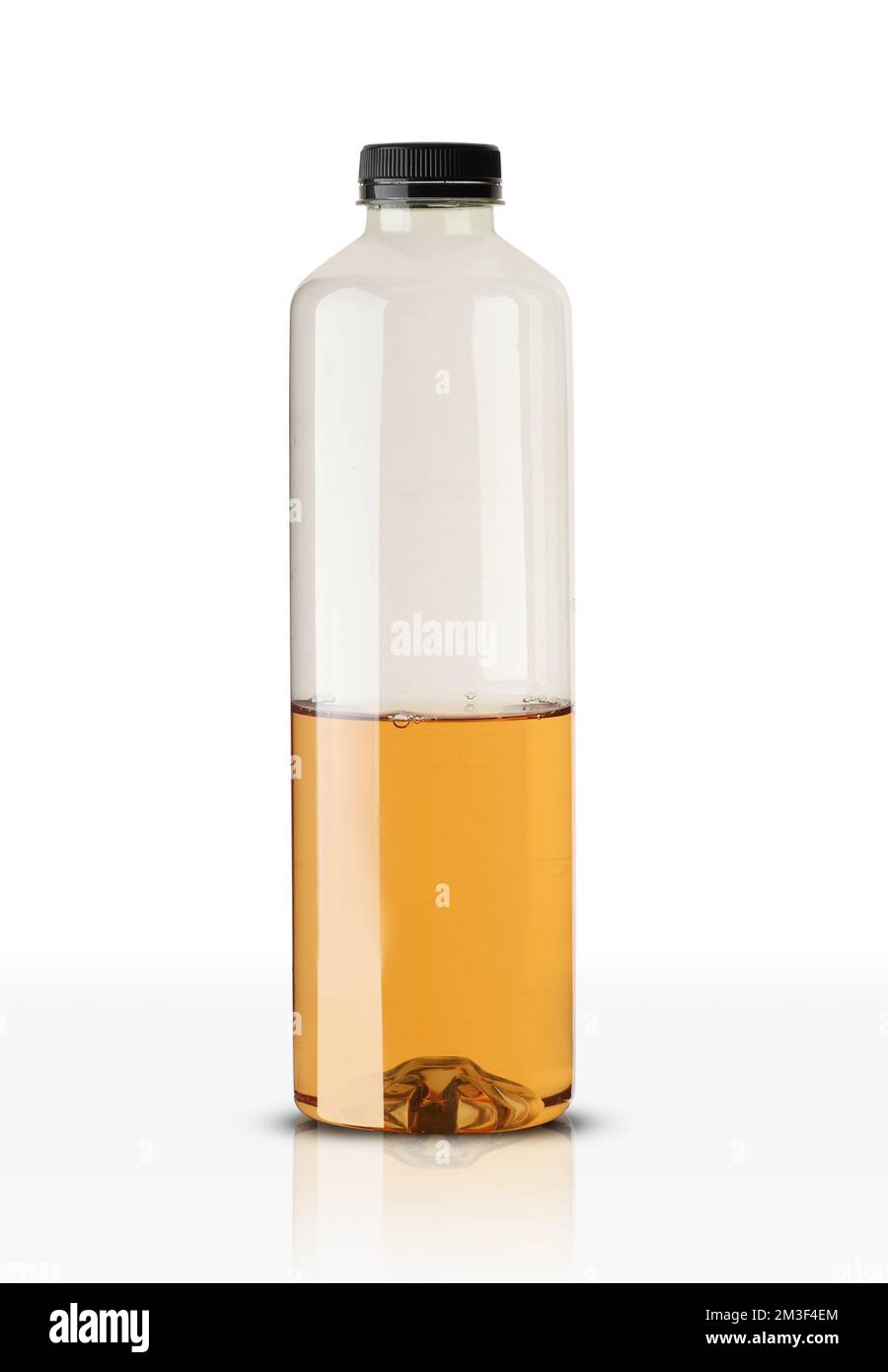 half-full juice bottle on white background Stock Photo - Alamy