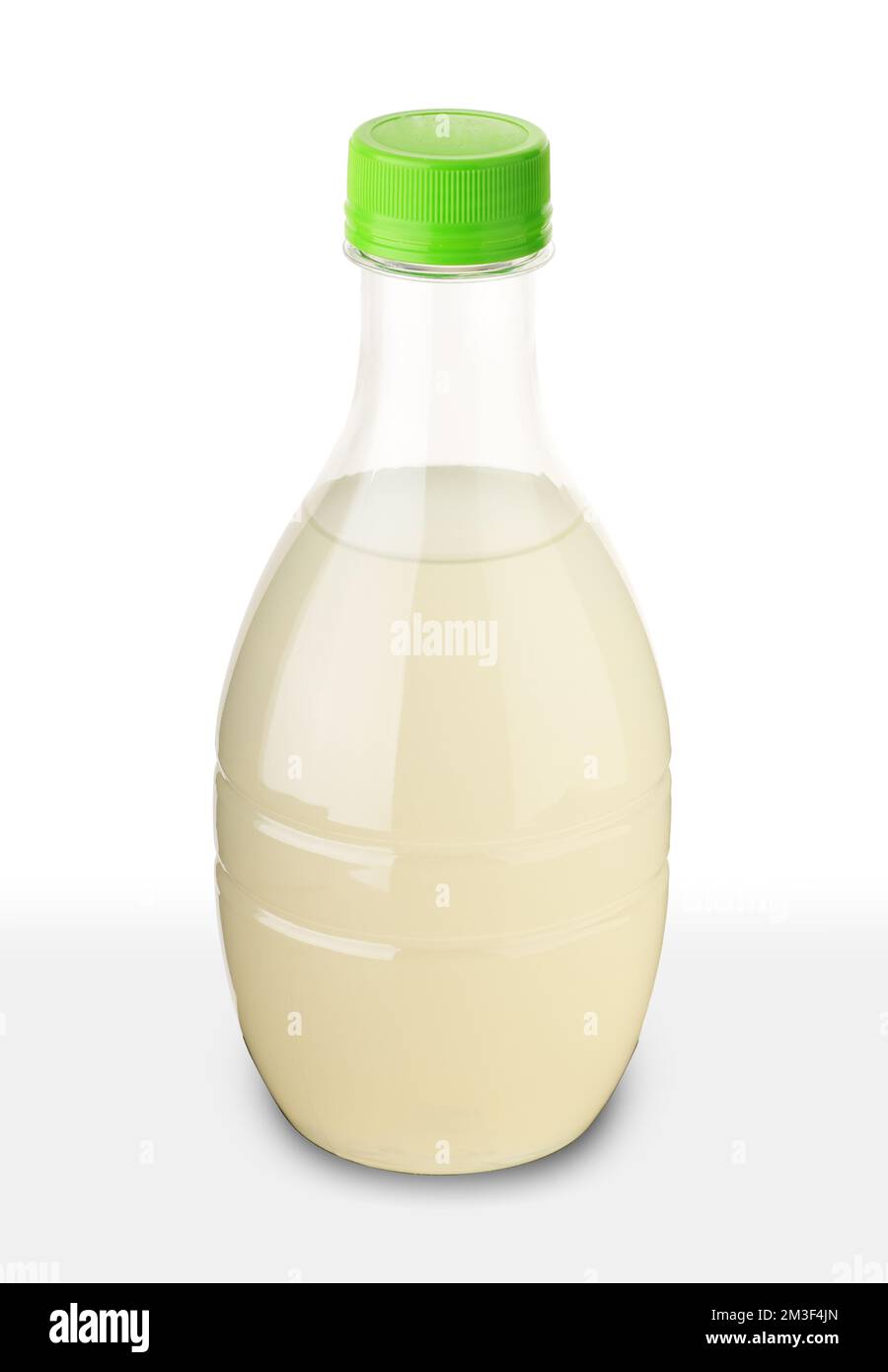 a small plastic bottle of lemonade on a white background Stock Photo ...